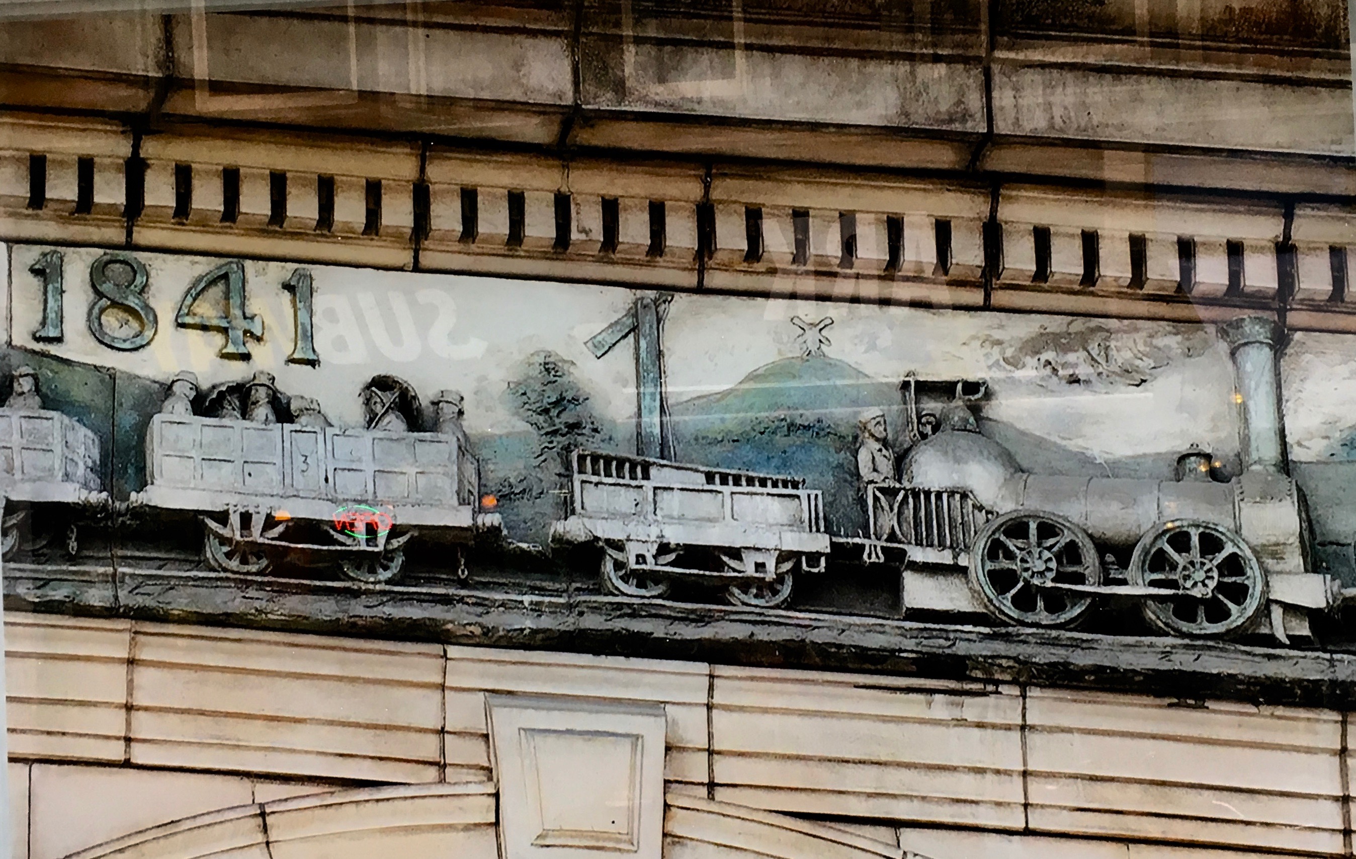 Train on a wall | A lover of the light